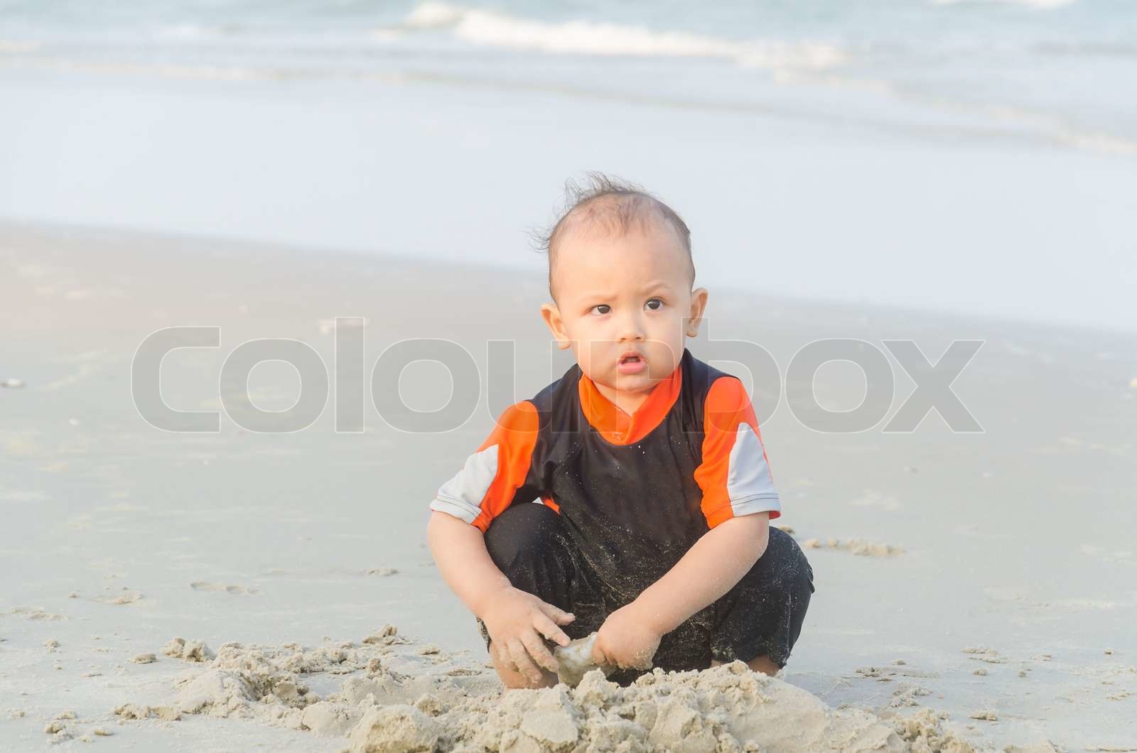 Children playing sand | Stock image | Colourbox