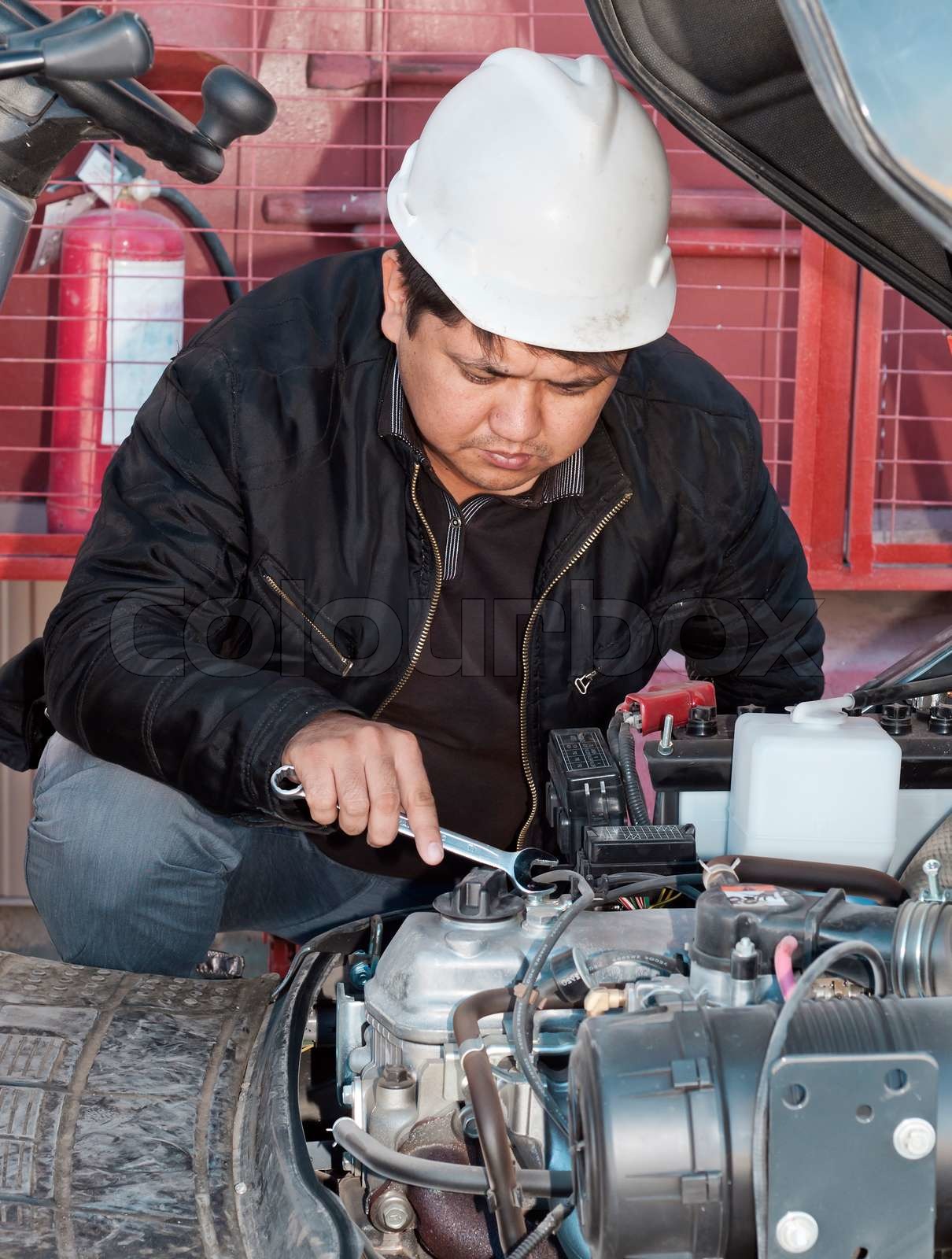 repairing the engine | Stock image | Colourbox