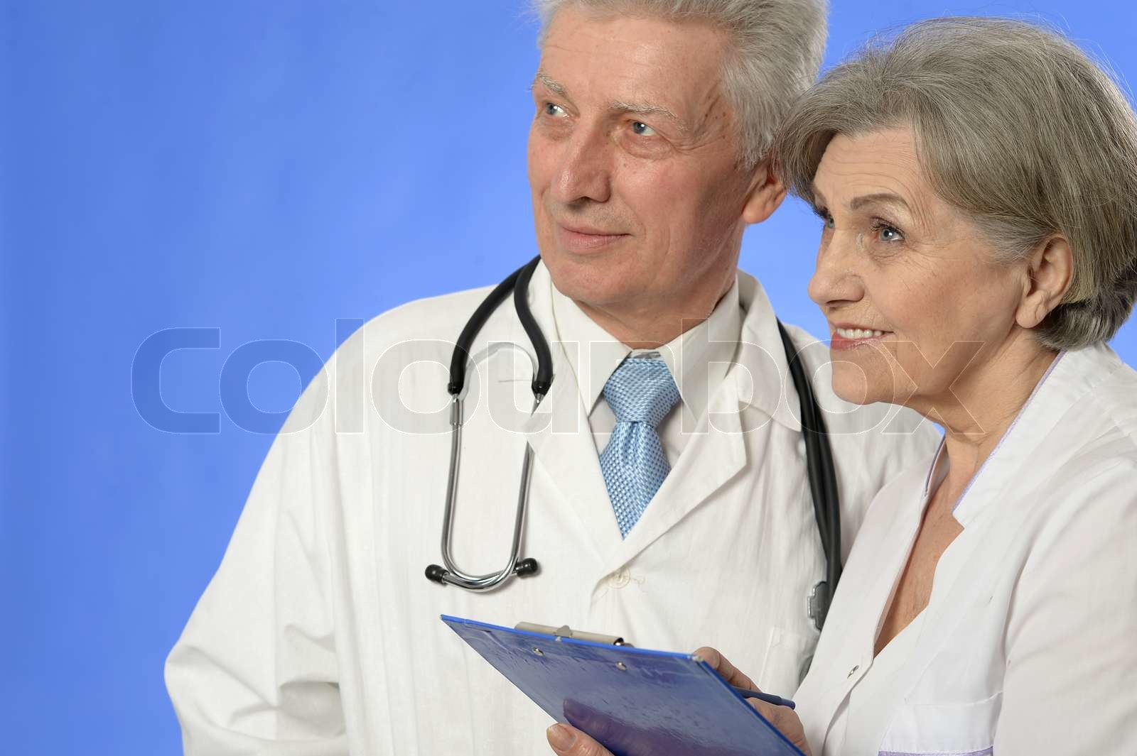 Two doctors on blue | Stock image | Colourbox