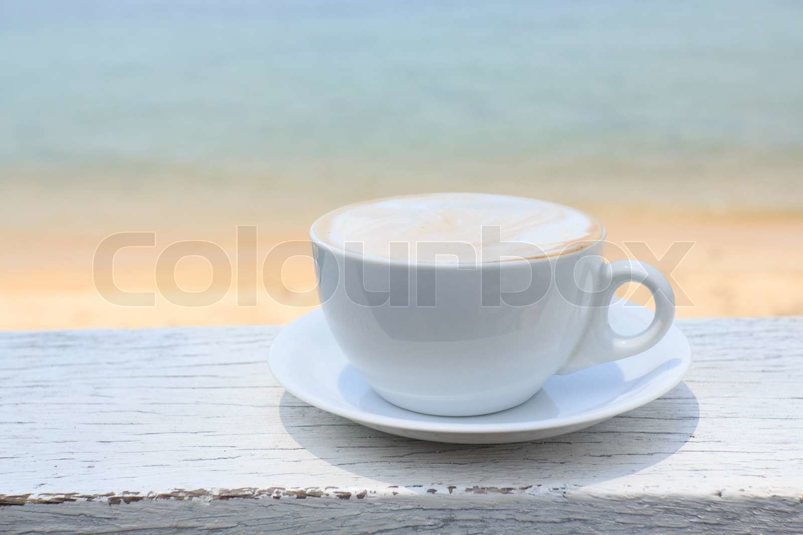 Morning coffee time on the beach | Stock image | Colourbox