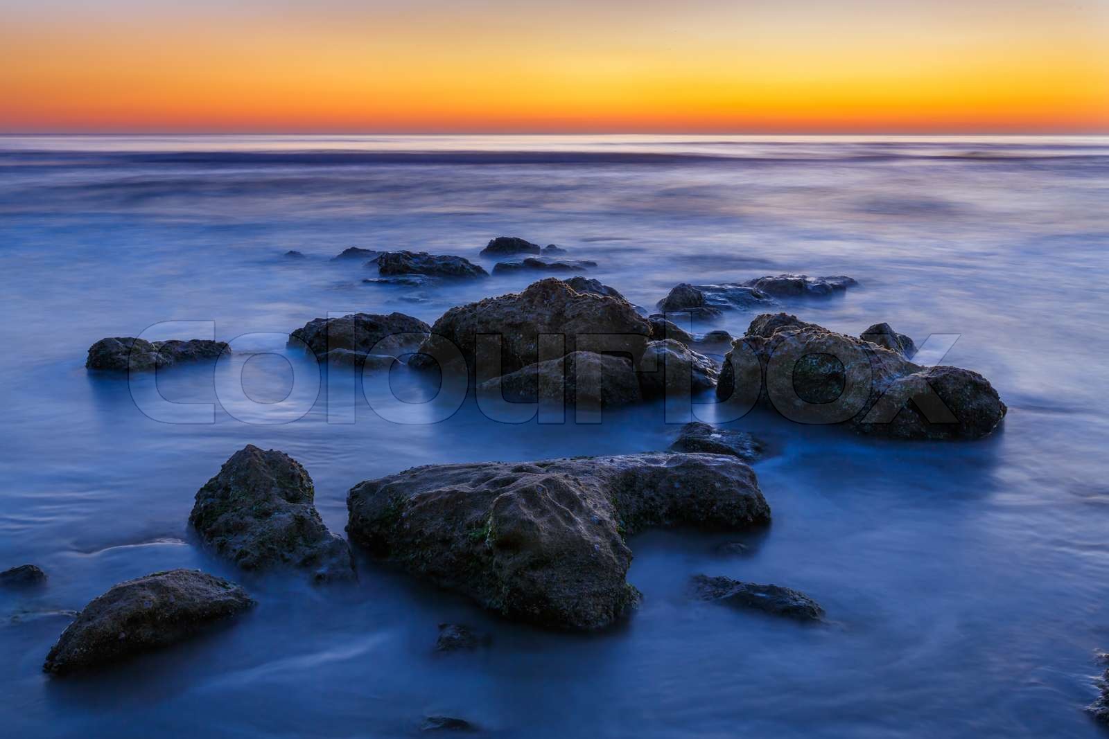 Beach Rocks Sunrise | Stock image | Colourbox