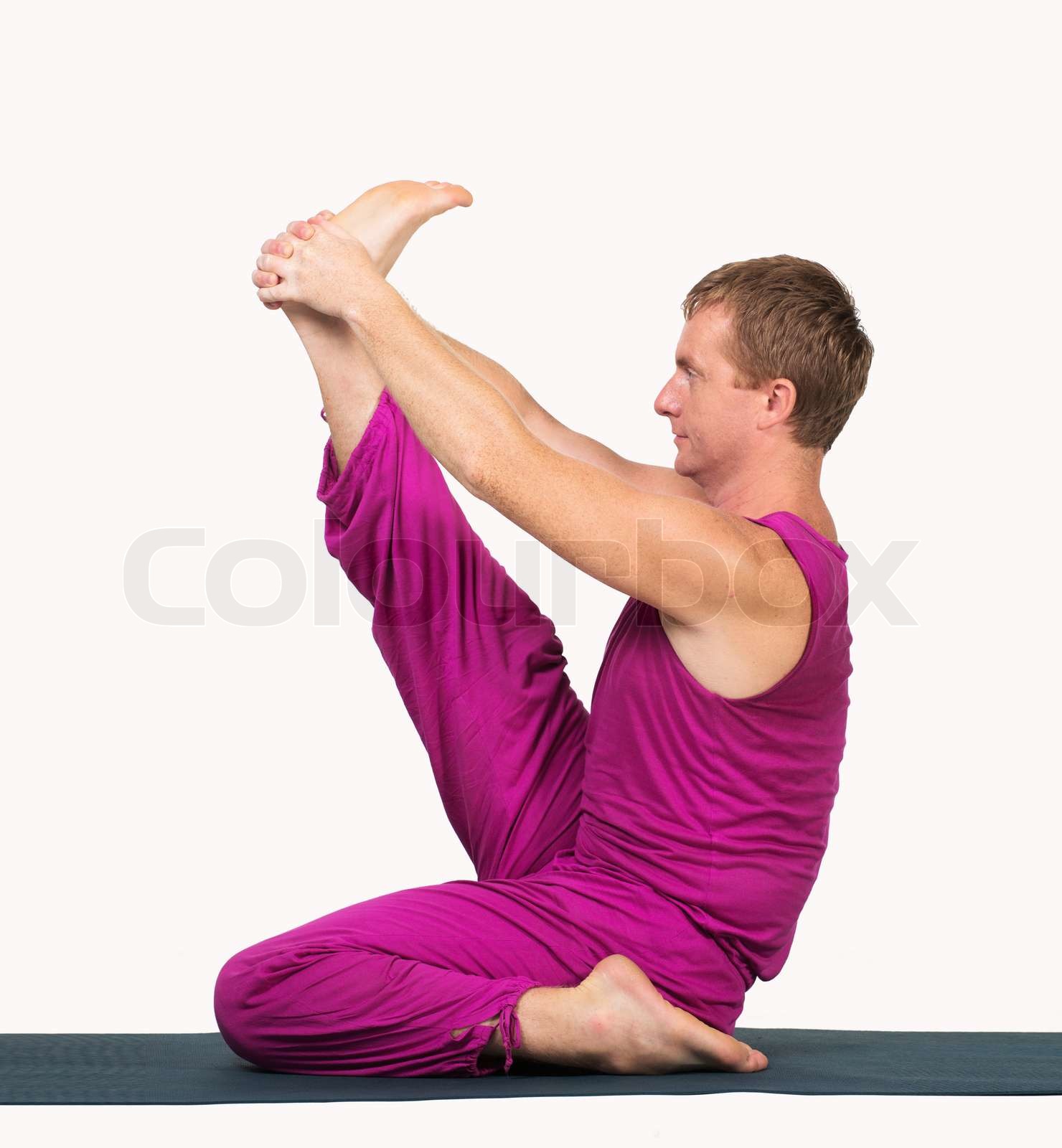 Man making yoga figure | Stock image | Colourbox