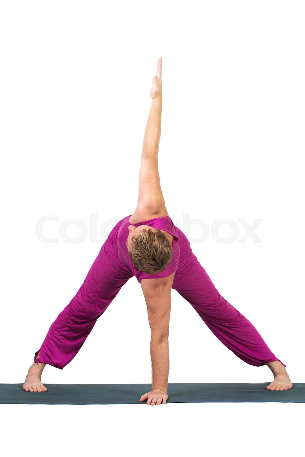 Man making yoga figure | Stock image | Colourbox