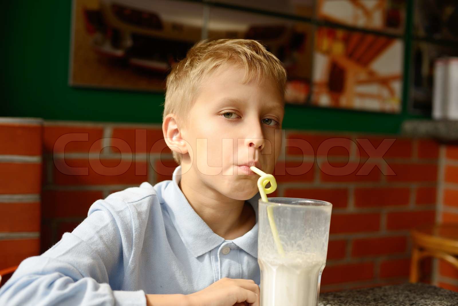 boy drinking milkshake | Stock image | Colourbox