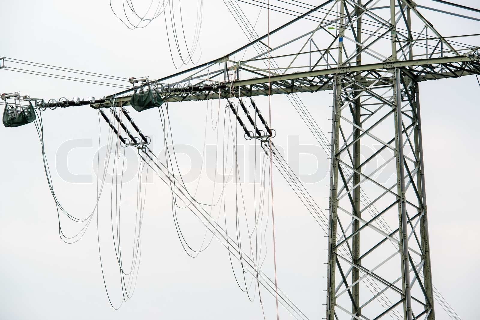 high voltage power pole construction works | Stock image | Colourbox