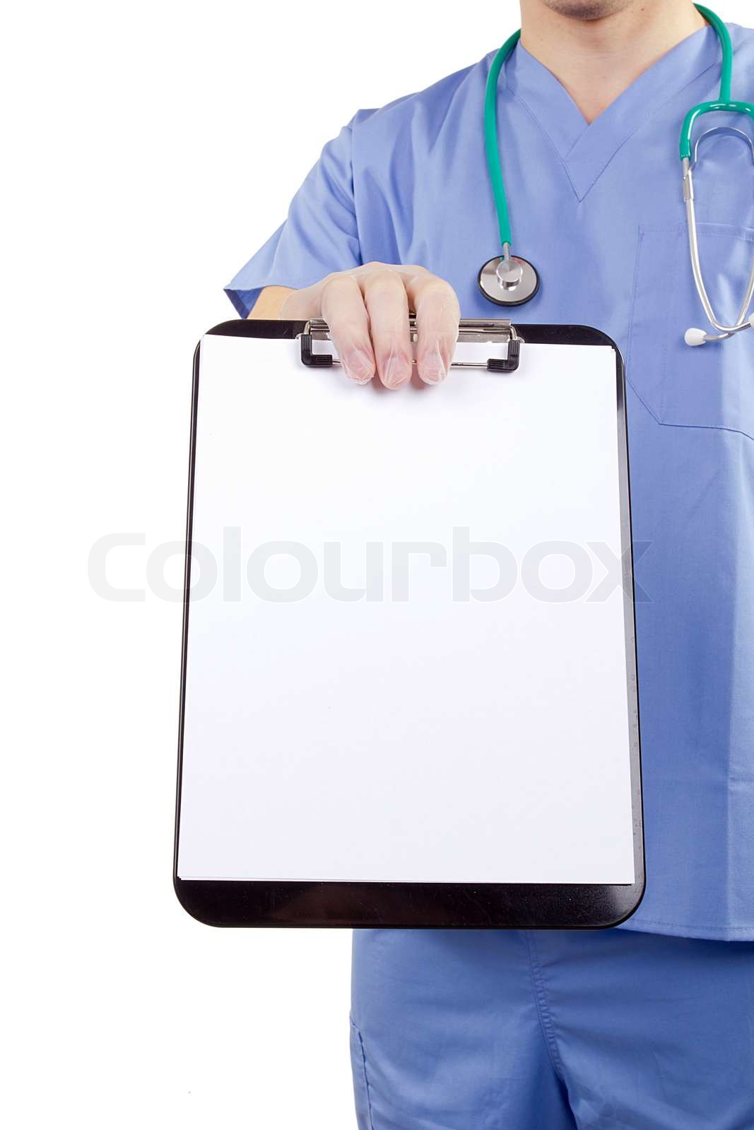 Doctor holds a clipboard | Stock image | Colourbox