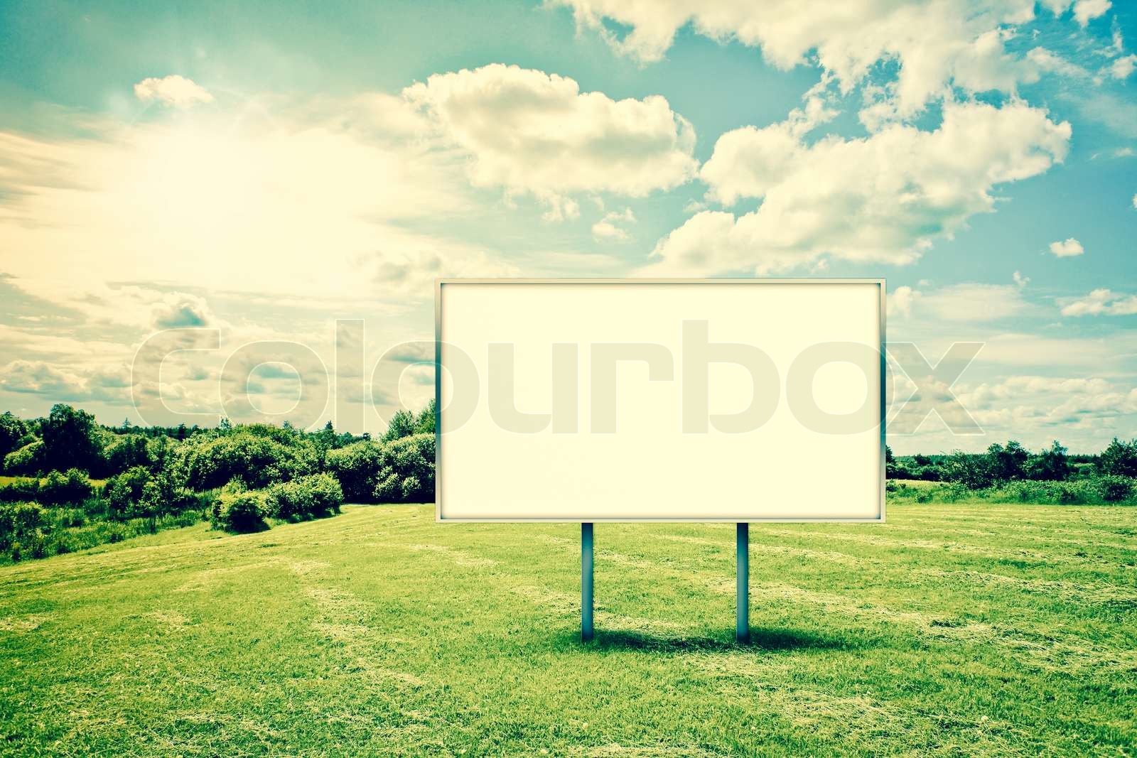 Billboard sign in a landscape | Stock image | Colourbox