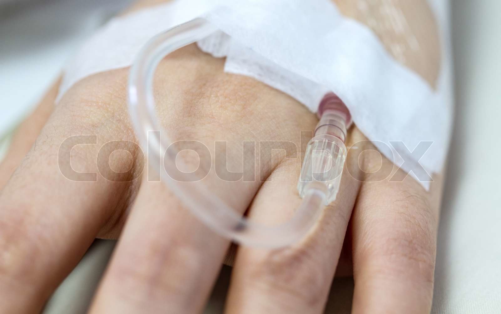 female hand with IV solution | Stock image | Colourbox