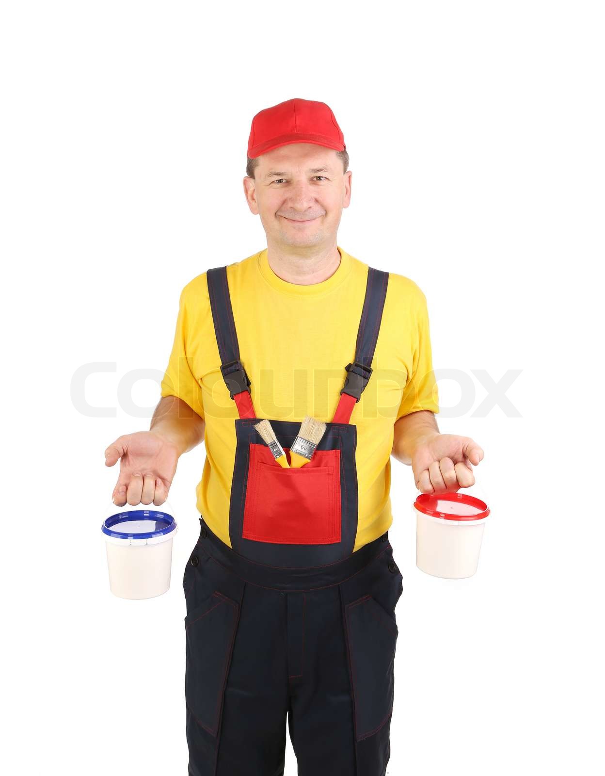 Arbeiter in Hut mit Eimer Farbe. | Stock Bild | Colourbox