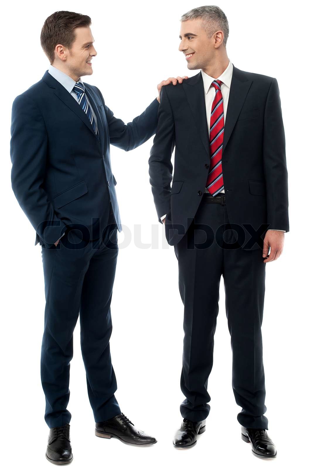 Two business partners talking together | Stock image | Colourbox