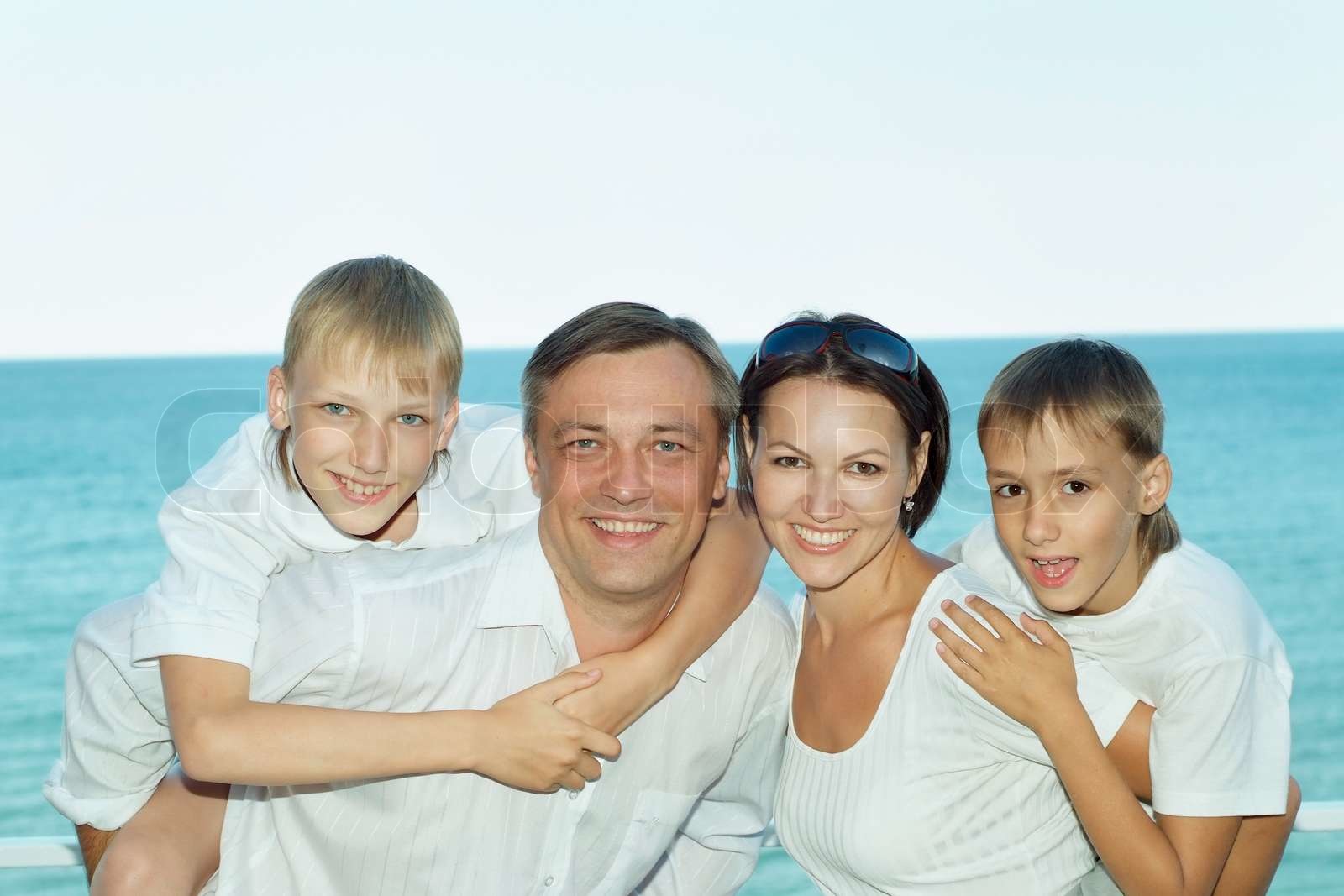 Happy family of four | Stock image | Colourbox
