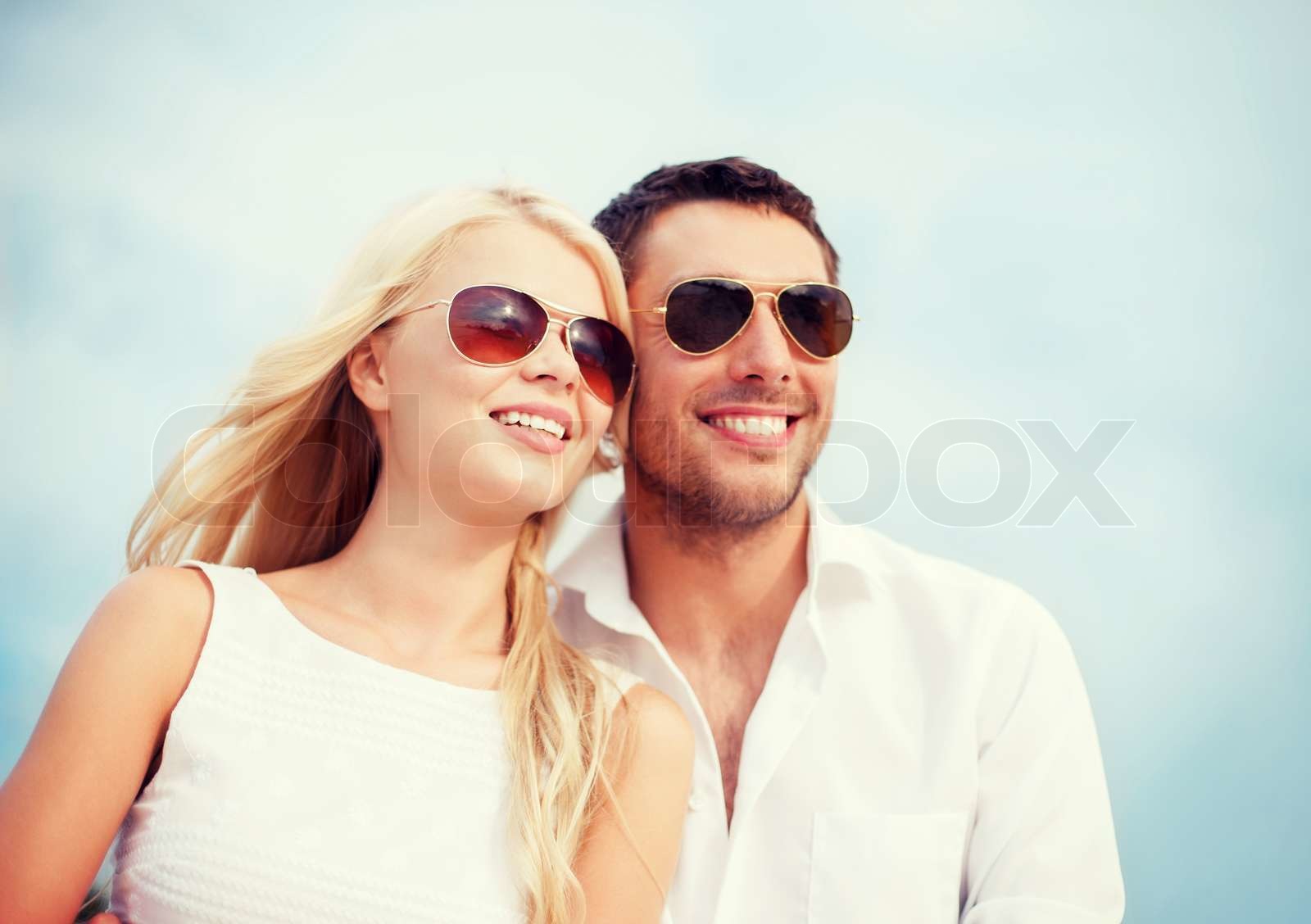 couple in shades at sea side | Stock image | Colourbox