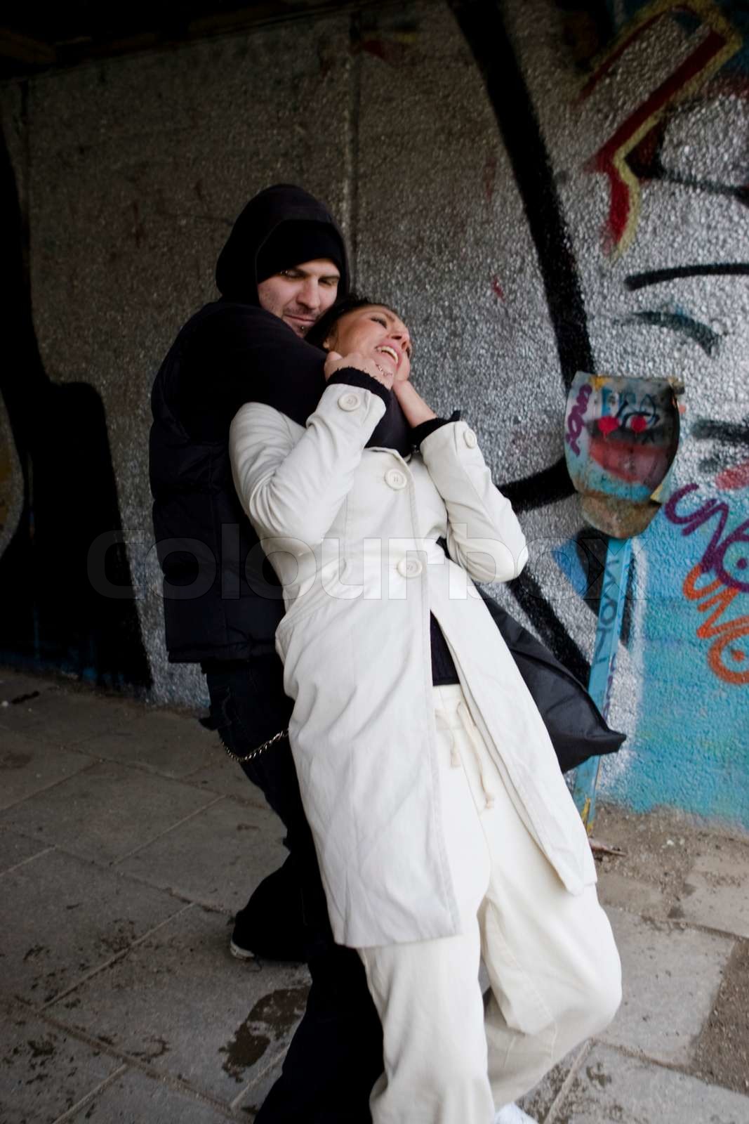 A man choking a woman's neck | Stock image | Colourbox
