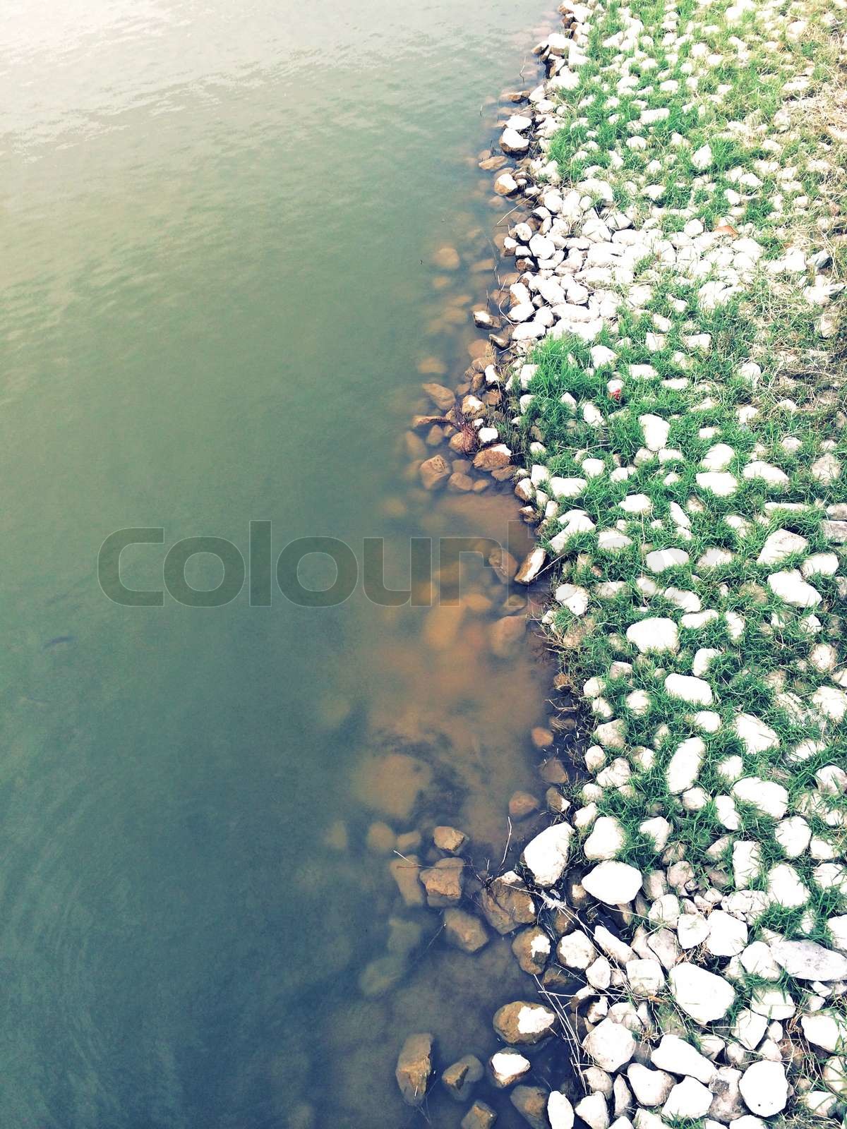 Riverside edge topview | Stock image | Colourbox
