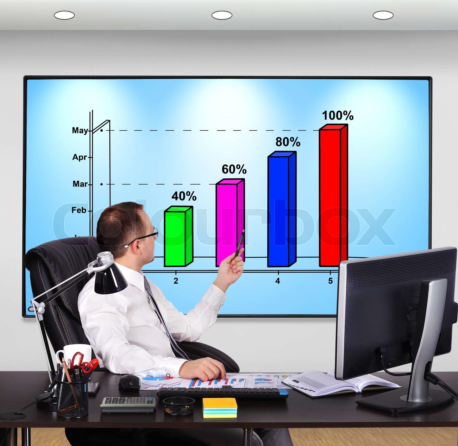 man pointing to chart | Stock image | Colourbox