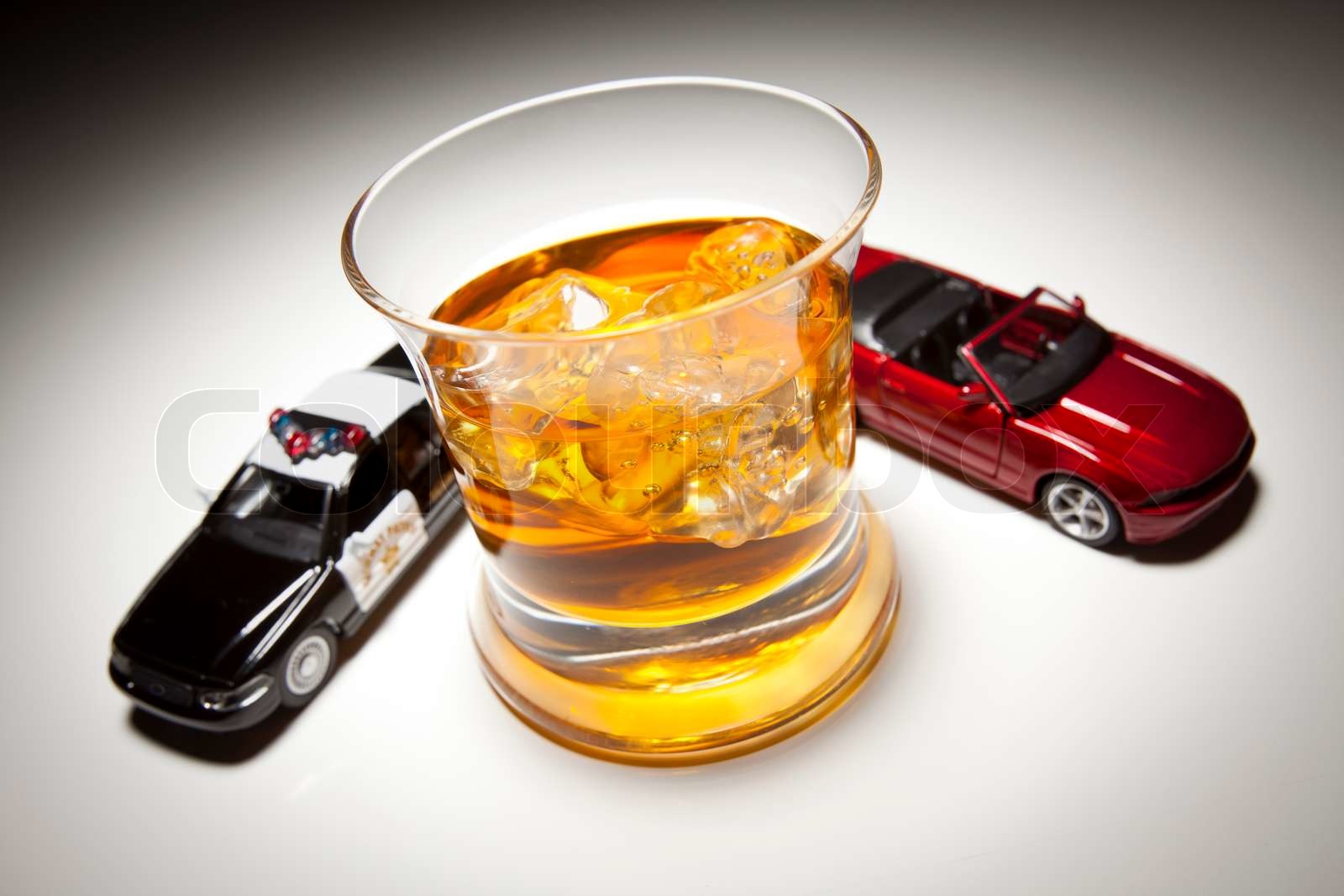 Police and Sports Car Next to Alcoholic Drink | Stock image | Colourbox