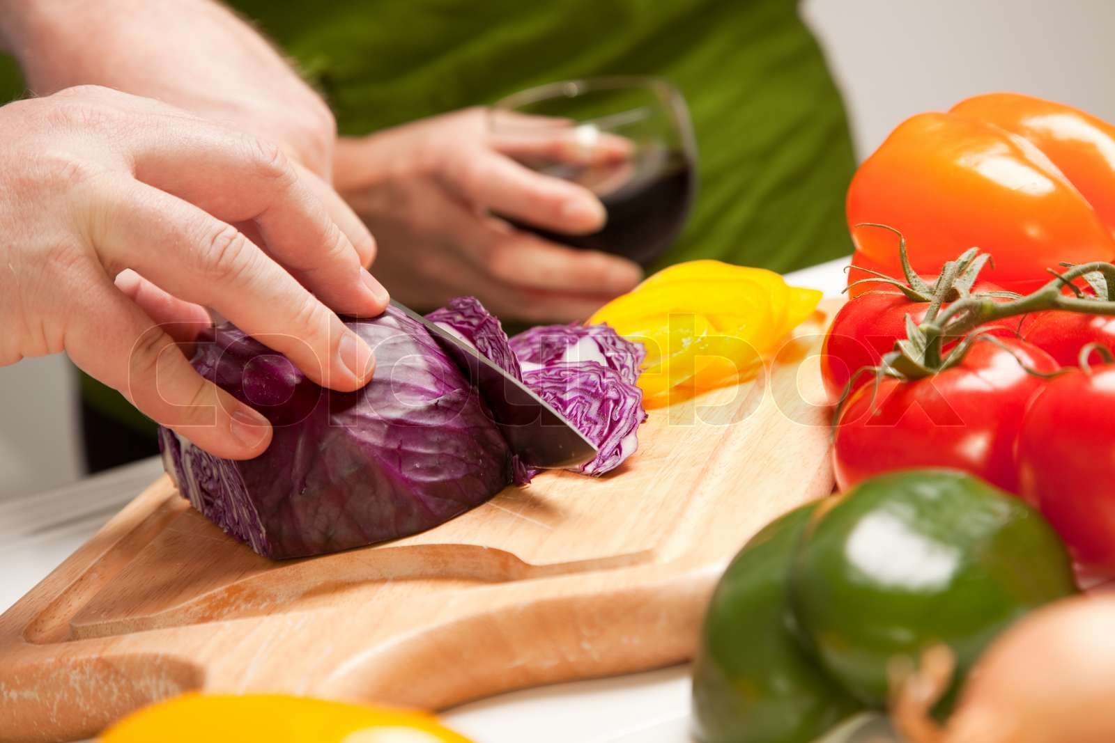 Man Slicing Vegetables | Stock image | Colourbox