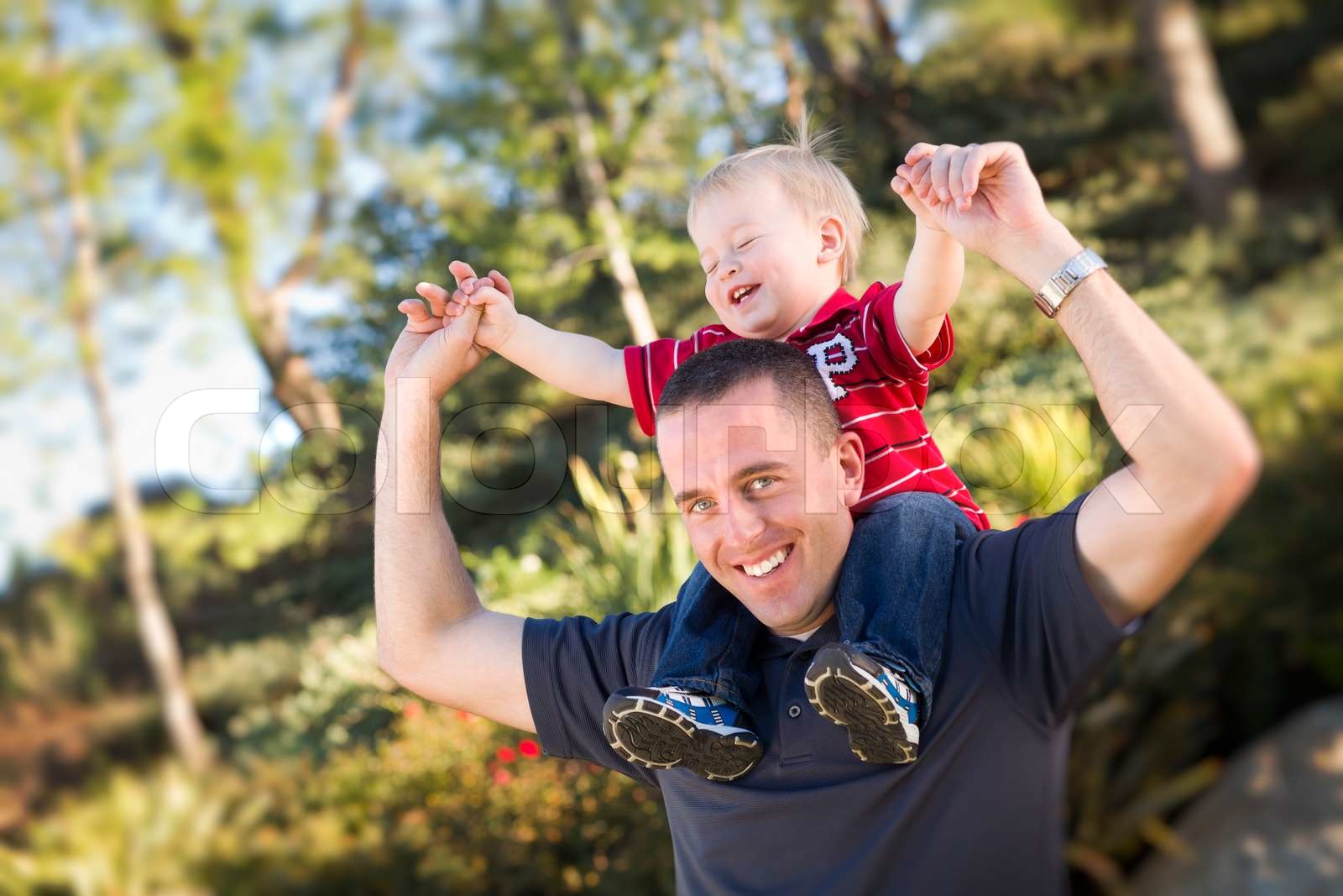 Young Laughing Father and Child Piggy Back | Stock image | Colourbox
