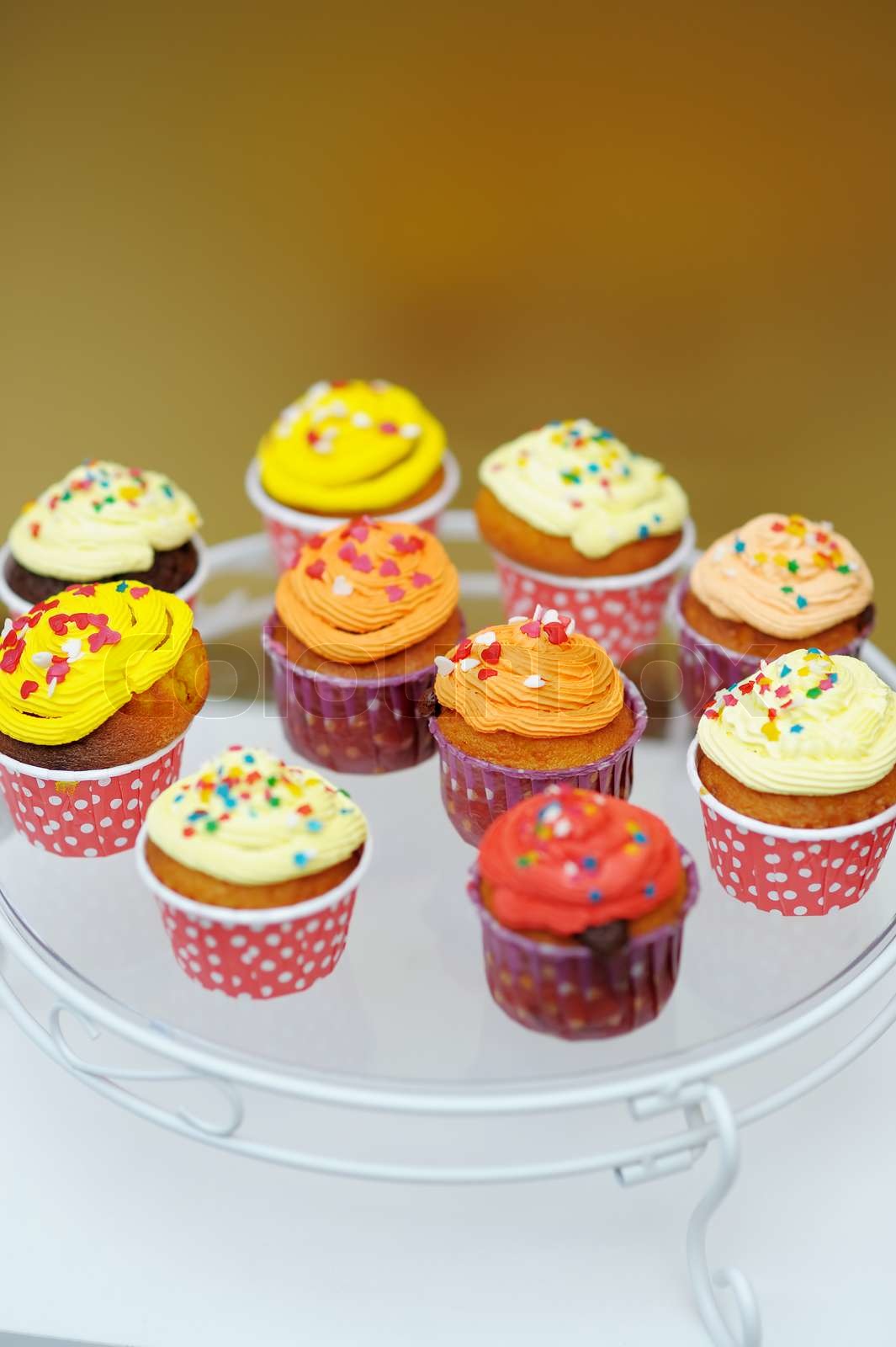 Cupcakes on glass plate | Stock image | Colourbox