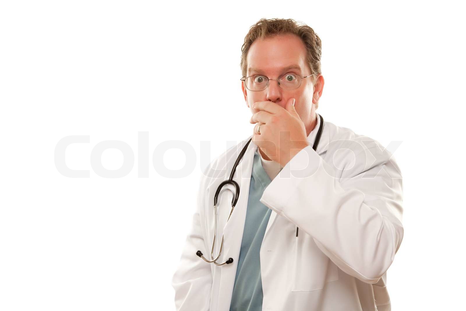 Male Doctor with Concerned Look and Hand Over Mouth | Stock image ...