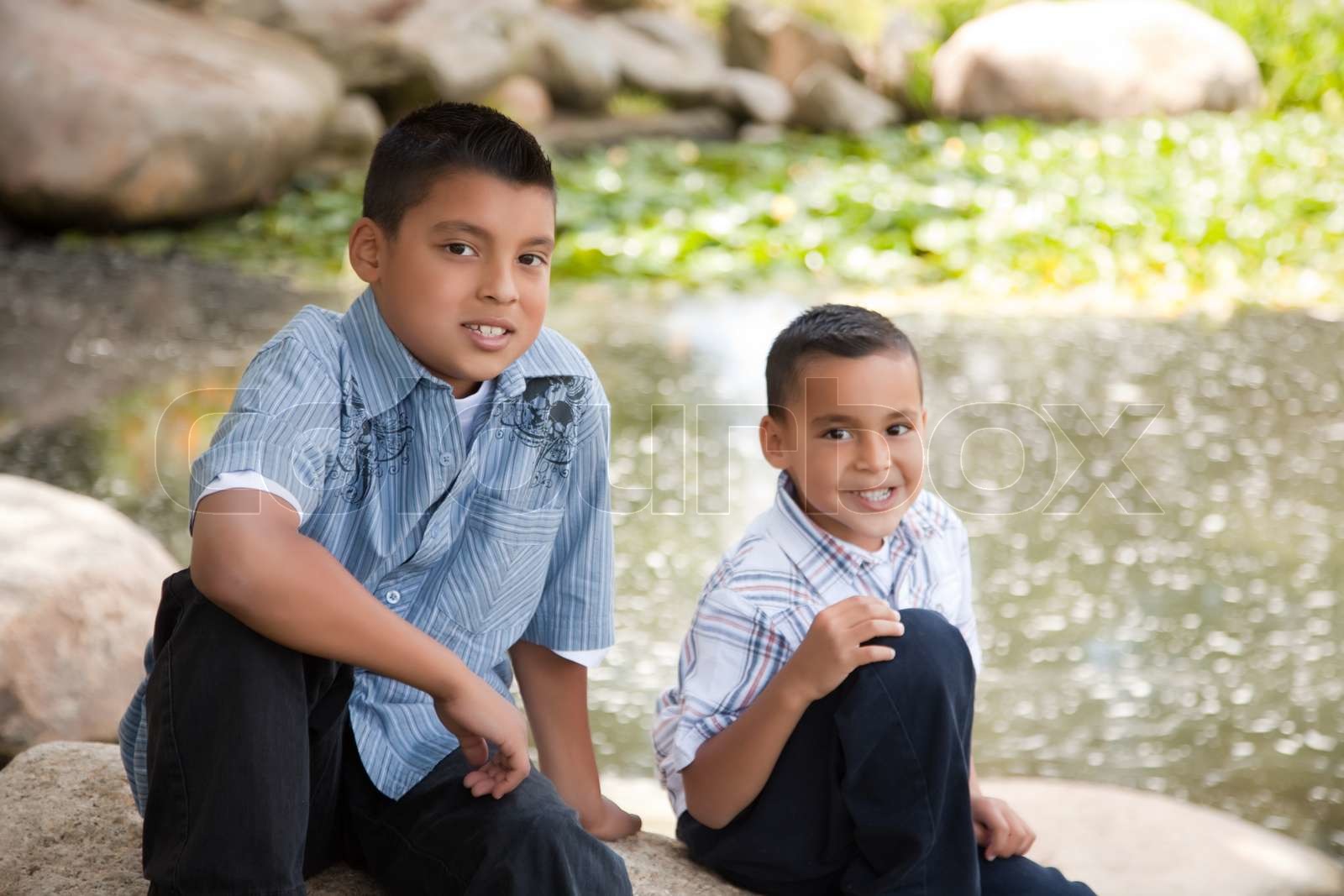 Two Hispanic Brothers at the Park | Stock image | Colourbox