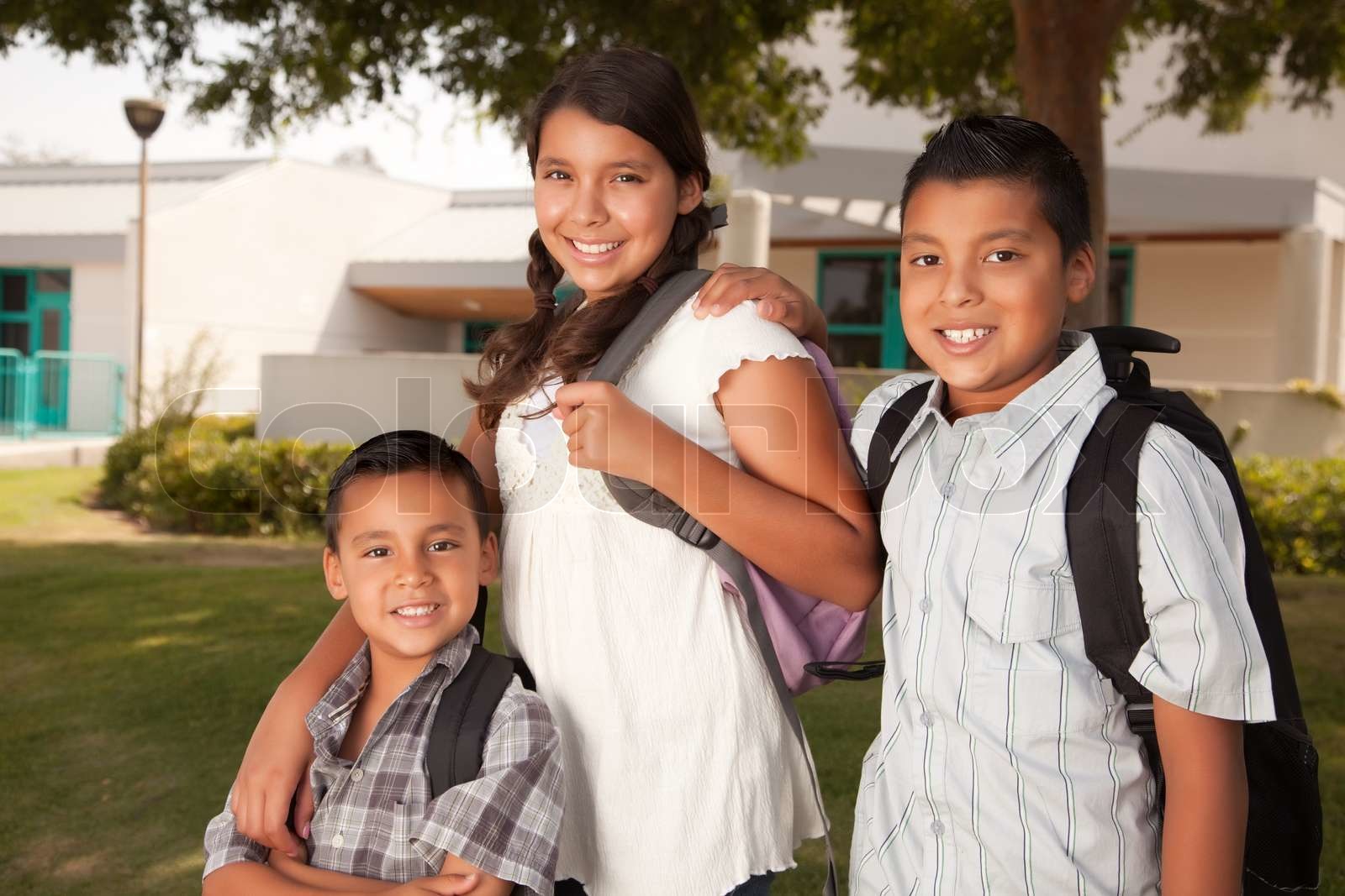 Cute Brothers and Sister Ready for School | Stock image | Colourbox