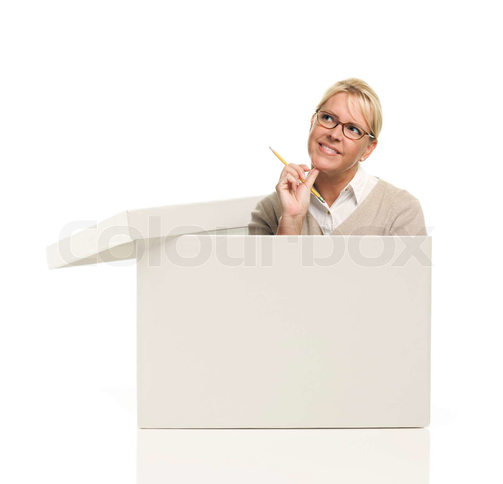 Pretty Female Popping Out and Thinking Outside The Box | Stock image ...