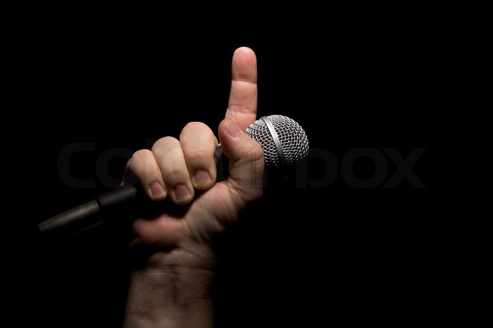 Microphone in Fist | Stock image | Colourbox