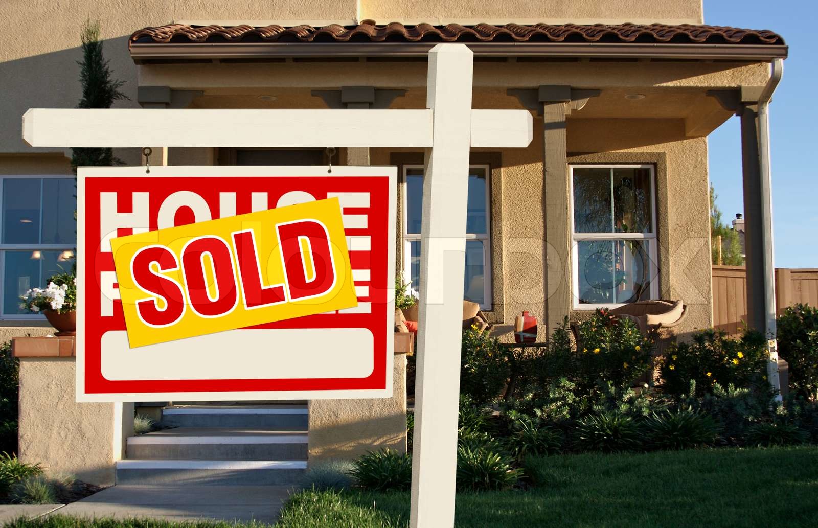 Sold Home For Sale Sign in Front of New House | Stock image | Colourbox
