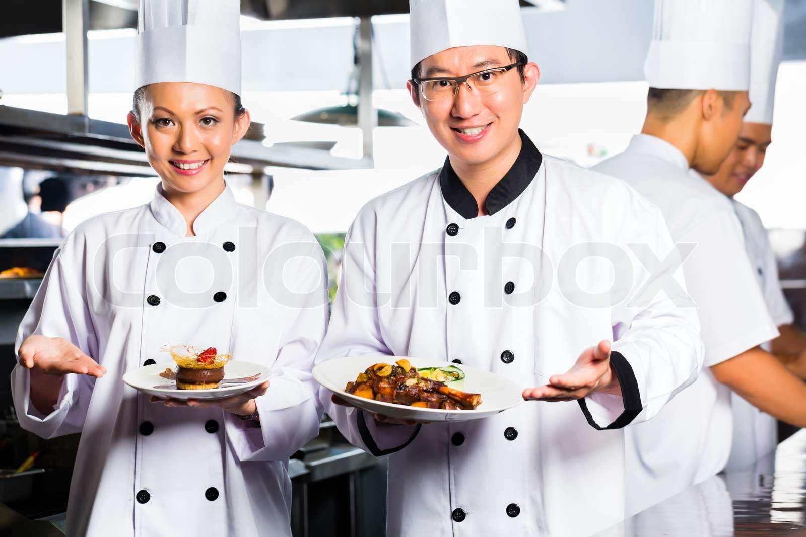 Asian Chef in restaurant kitchen cooking | Stock image | Colourbox
