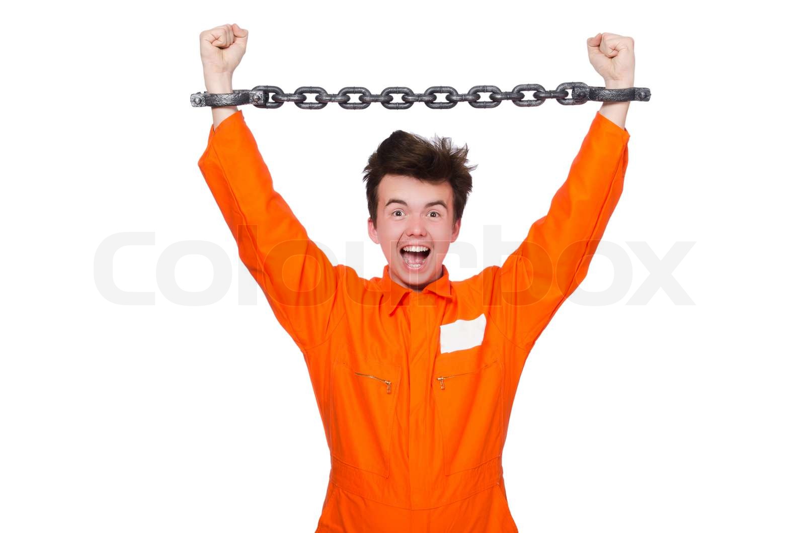 Young inmate with chains isolated on the white | Stock image | Colourbox