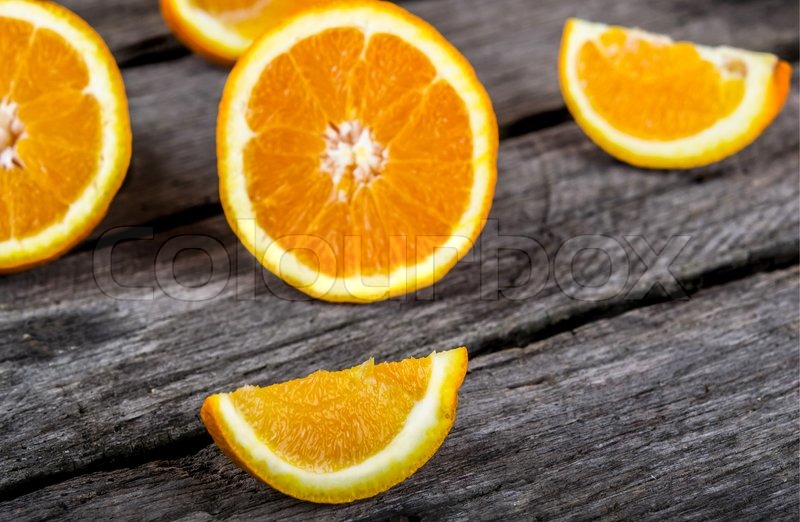 Fresh and ripe orange fruits on a ... | Stock image | Colourbox
