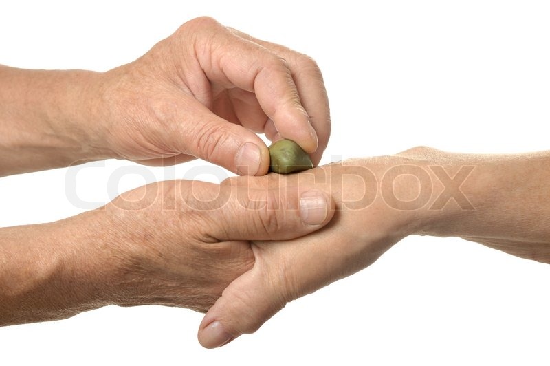 Hand hold closeup isolated on a white ... | Stock image | Colourbox