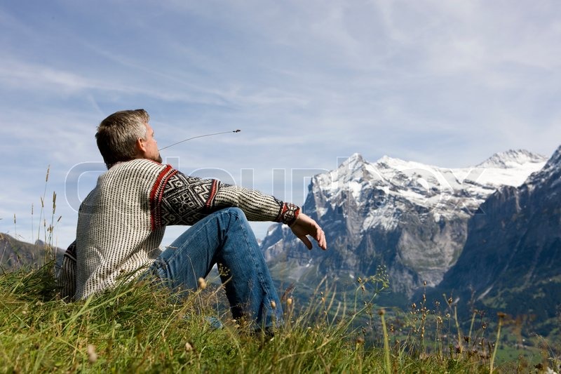 A man enjoying the view in Switzerland | Stock image | Colourbox