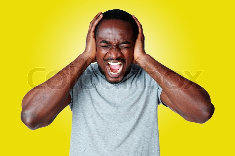 Portrait of african man shouting and ... | Stock image | Colourbox