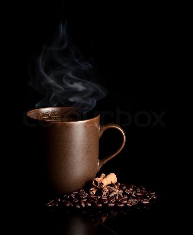 Aromatic cup of coffee with smoke and ... | Stock image | Colourbox