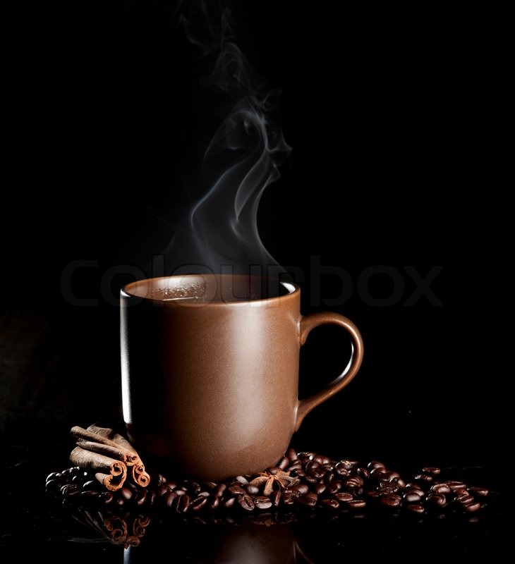 Aromatic cup of coffee with smoke and ... | Stock image | Colourbox