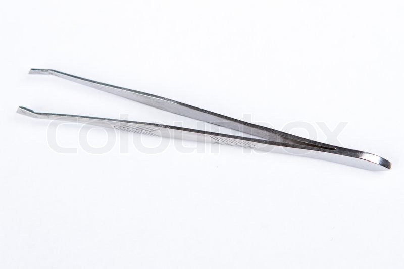 Pair of steel tweezers, isolated on ... | Stock image | Colourbox