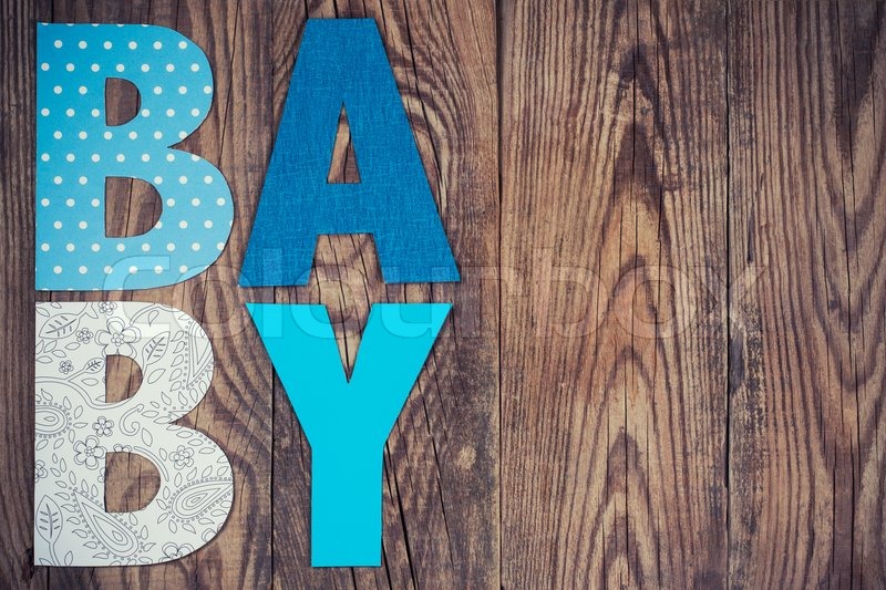 Letters of word baby on wooden ... | Stock image | Colourbox