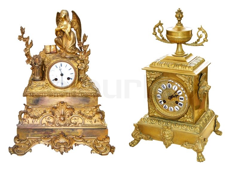Antique gold colored table clocks | Stock image | Colourbox
