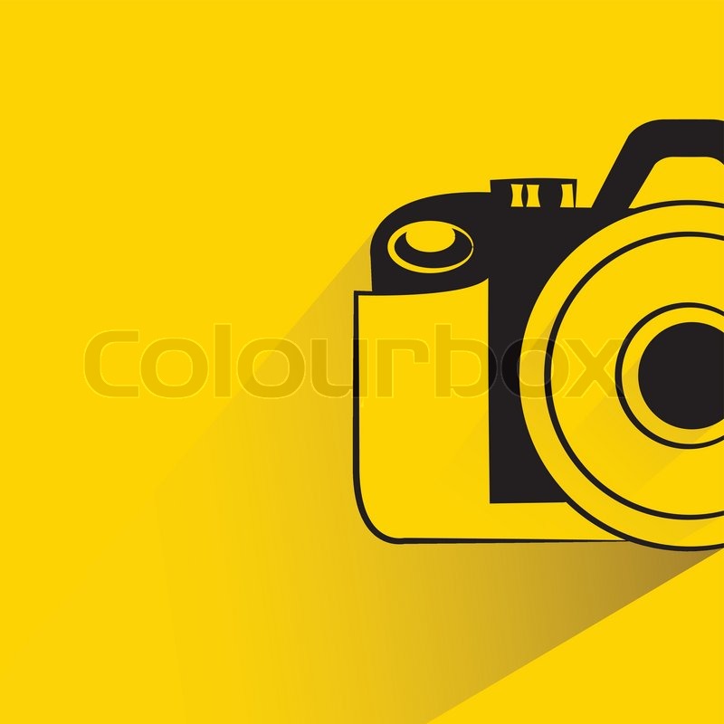 Camera on yellow background | Stock vector | Colourbox