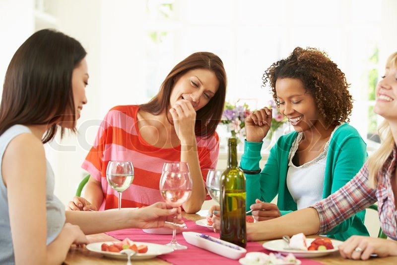 Group Of Women Sitting Around Table ... | Stock image | Colourbox