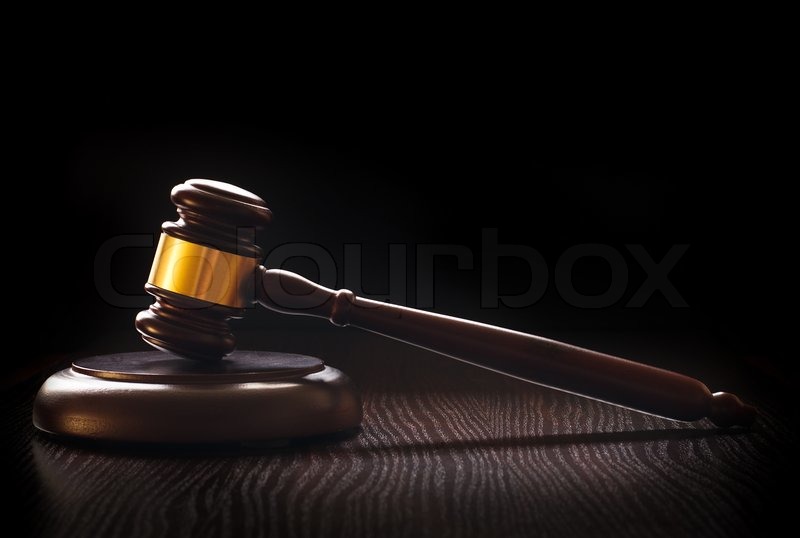 Wooden gavel with an ornamental brass ... | Stock image | Colourbox