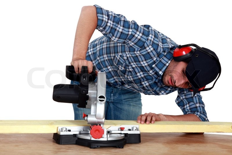 Man using circular saw | Stock image | Colourbox
