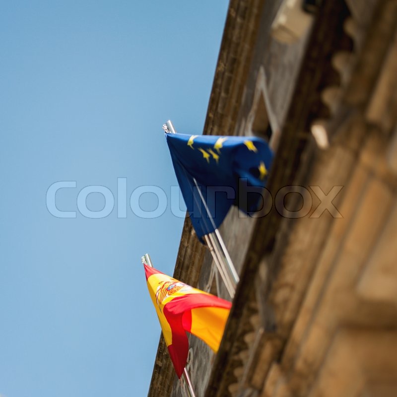 Spanish flag and European Union flag on ... | Stock image | Colourbox
