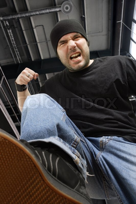 Photo of an angry thug beating me while ... | Stock image | Colourbox
