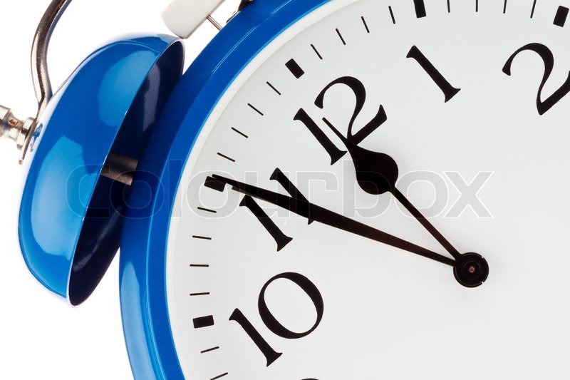 11:55 on a clock. time for decisions | Stock image | Colourbox