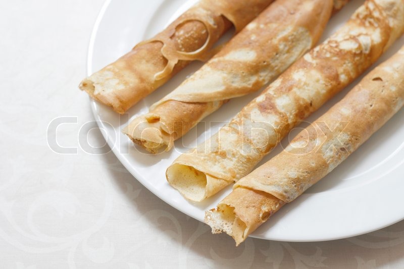 Rolled crepes on a plate | Stock image | Colourbox