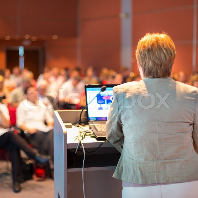 Senior business woman lecturing at ... | Stock image | Colourbox