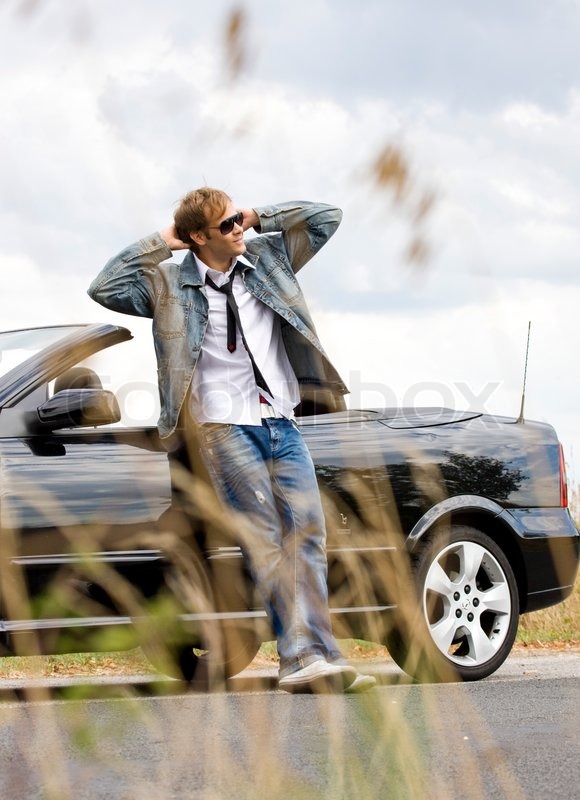 A caucasian man standing next to his ... | Stock image | Colourbox